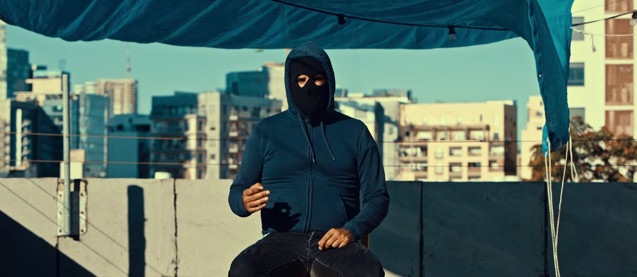 Who is Accomplice X in The Masked Scammer?